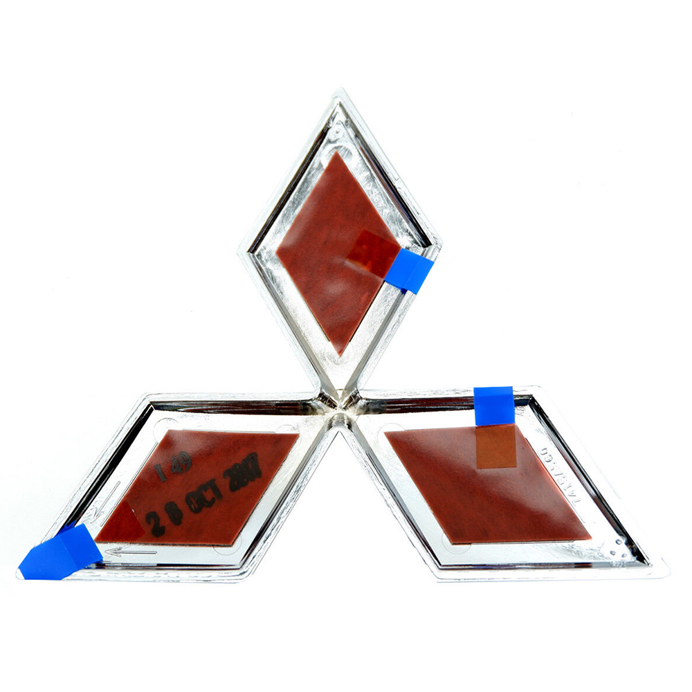 Genuine Mitsubishi Front Grille Badge Mirage Triton 7415A560